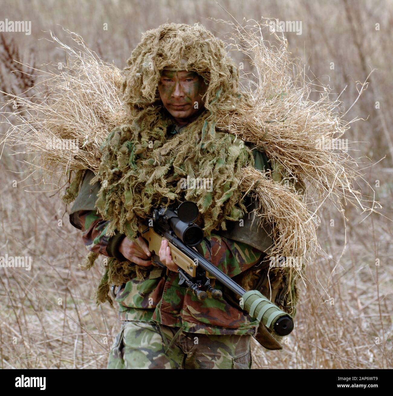 British Infantryman with a long range sniper rifle L115A3 which has a ...
