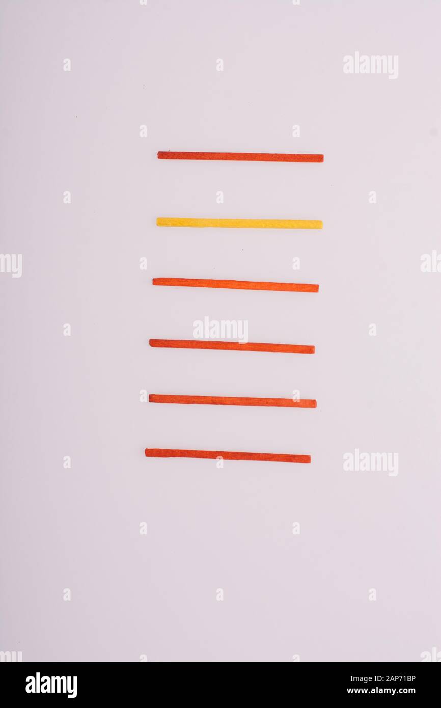 Sticks of various colors on awhite background Stock Photo - Alamy