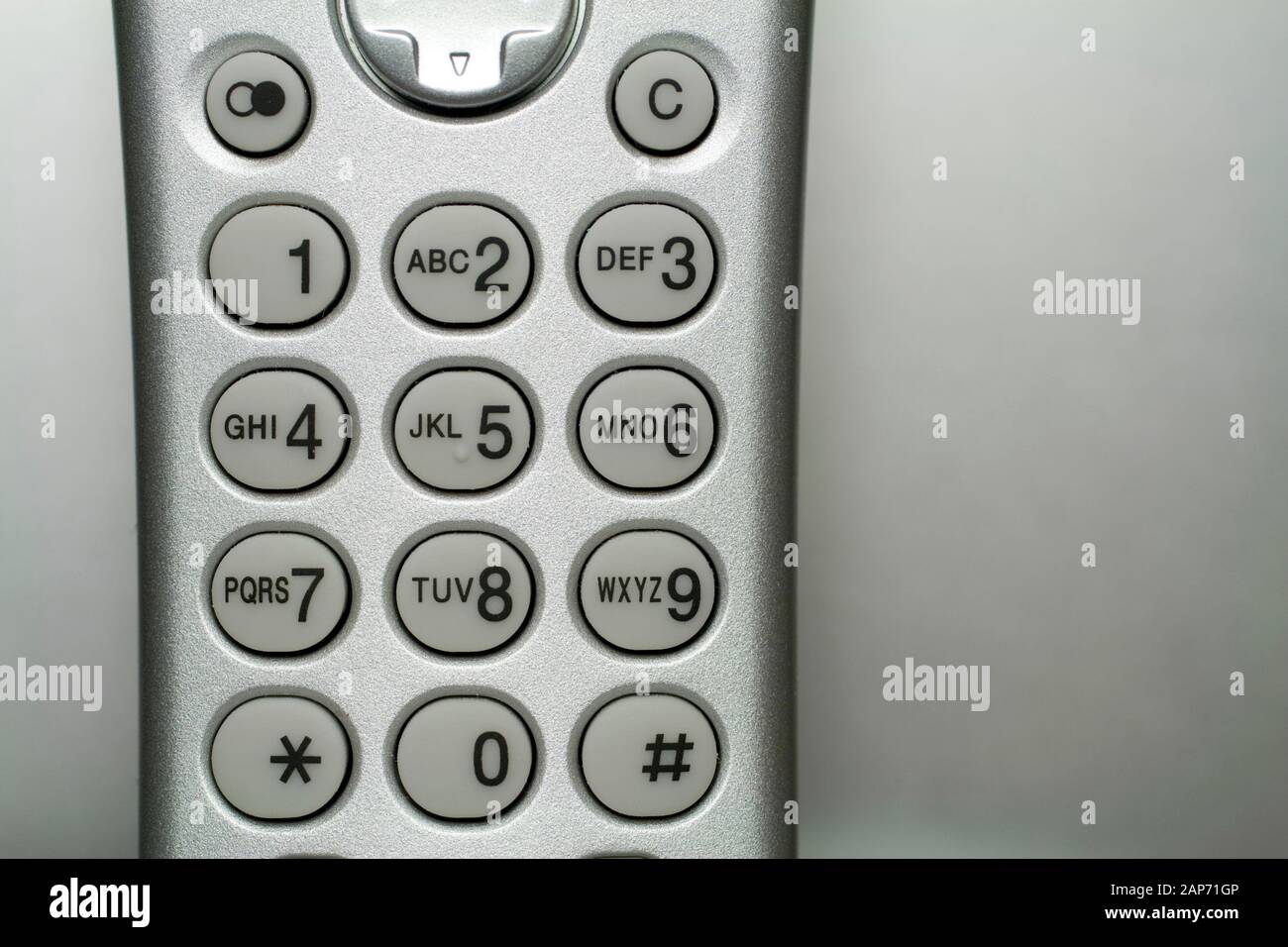 Close up shot of a silver cordless phone from the early 2000's Stock ...