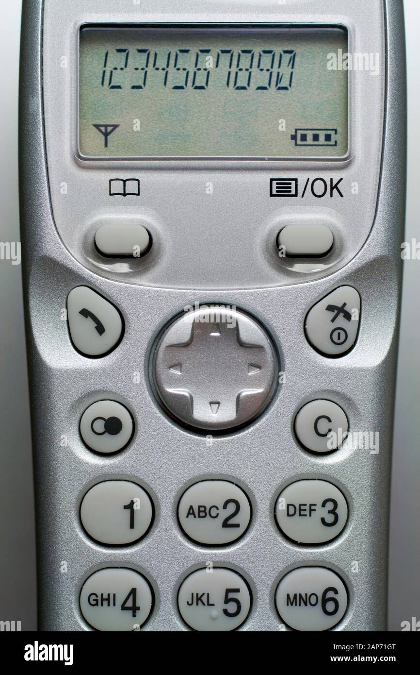 Close up shot of a silver cordless phone from the early 2000's Stock ...