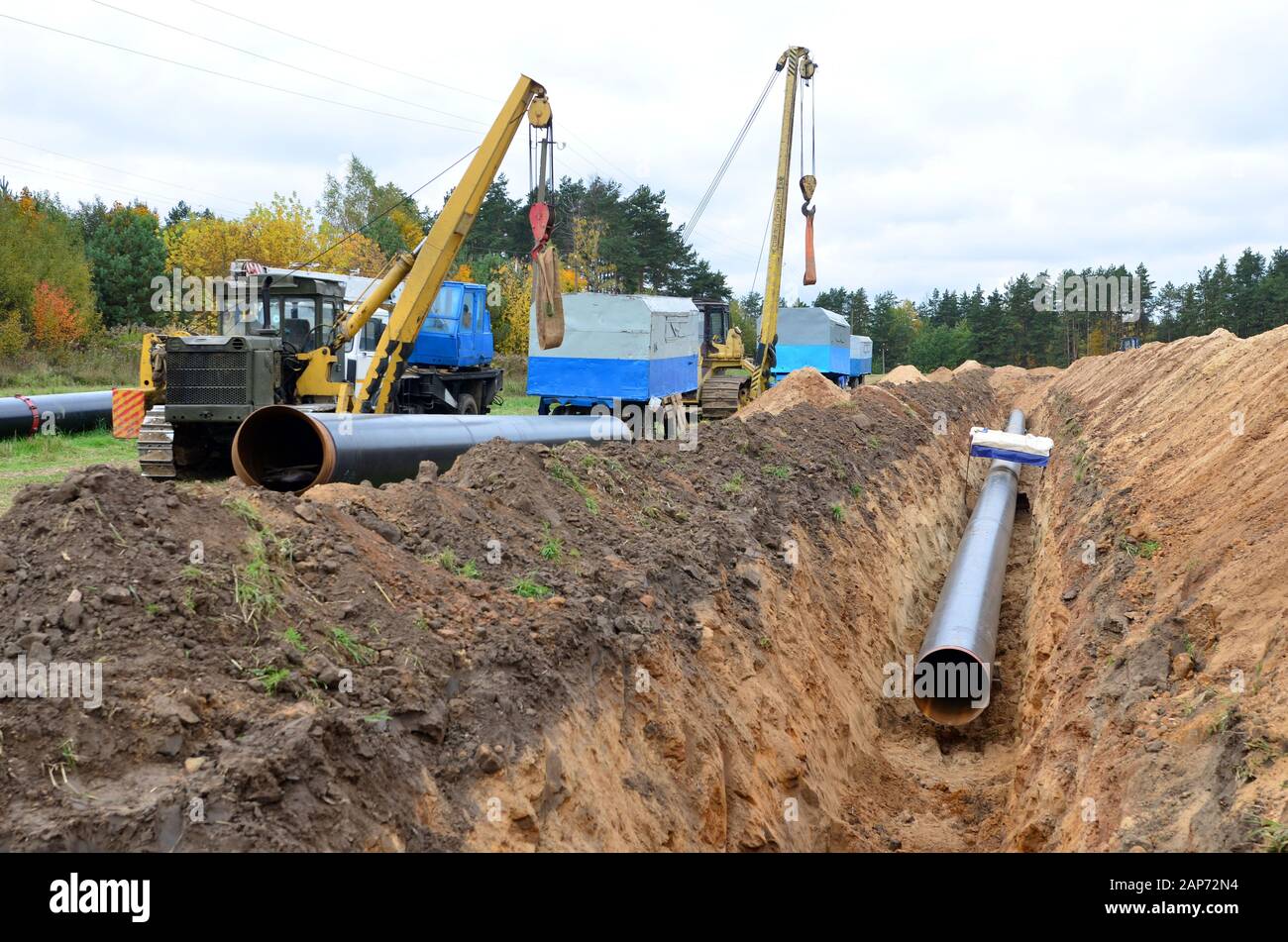 A Dug trench in the ground for the installation and installation of ...