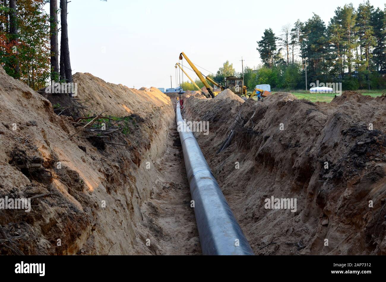 A Dug trench in the ground for the installation and installation of ...