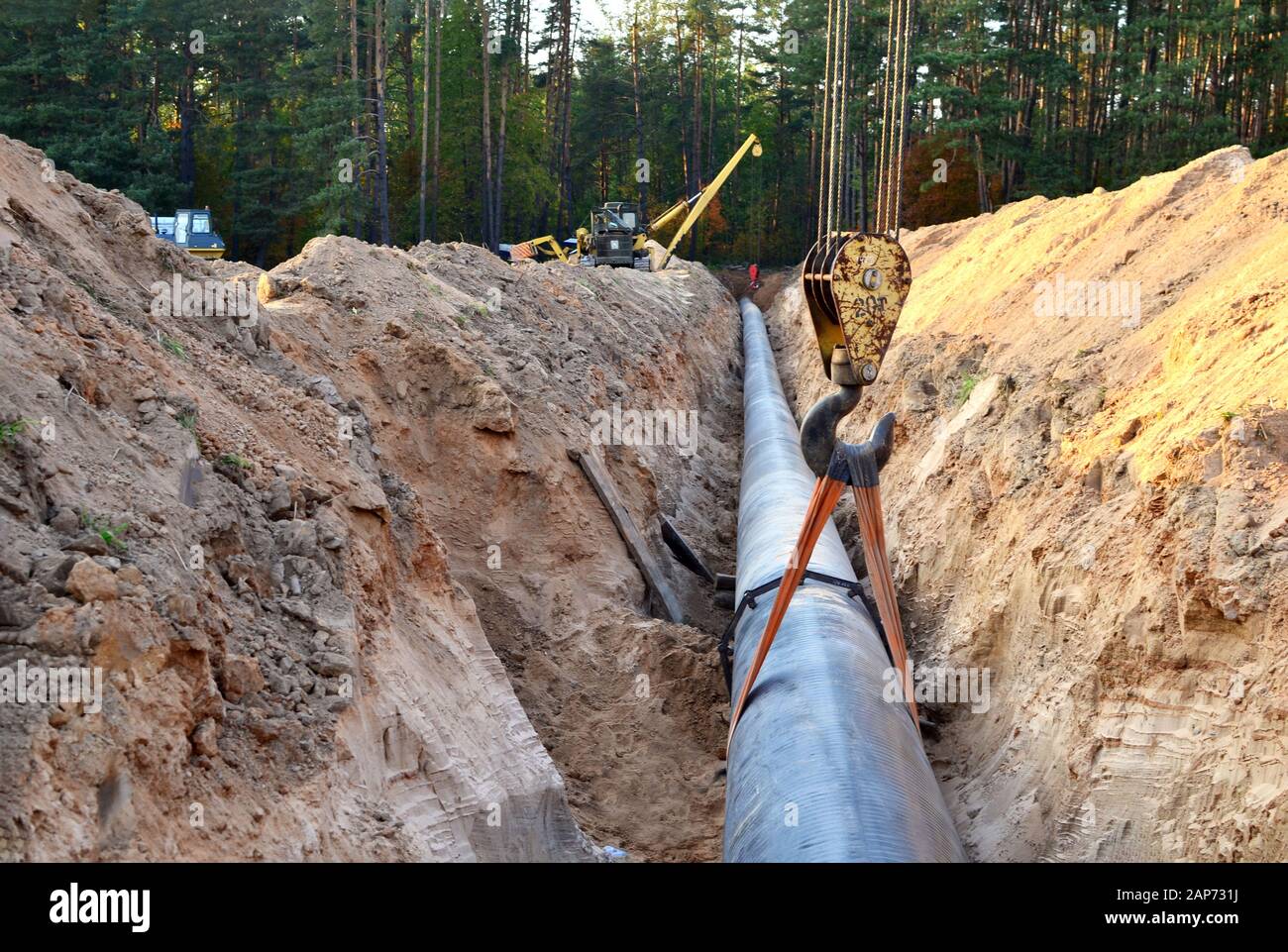 A Dug trench in the ground for the installation and installation of ...