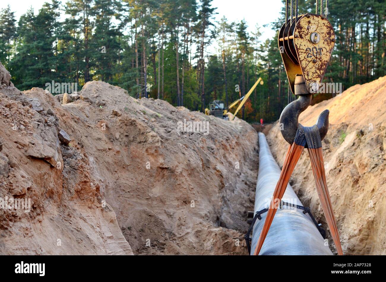 A Dug trench in the ground for the installation and installation of ...