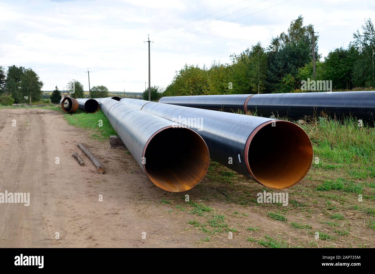 Natural gas pipeline construction work. A dug trench in the ground for ...
