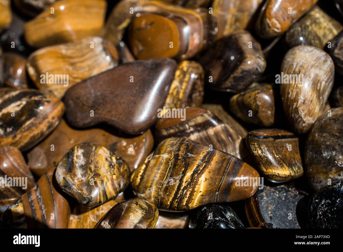 tiger's eye and hawk's eye gemstone as natural mineral rock specimen ...