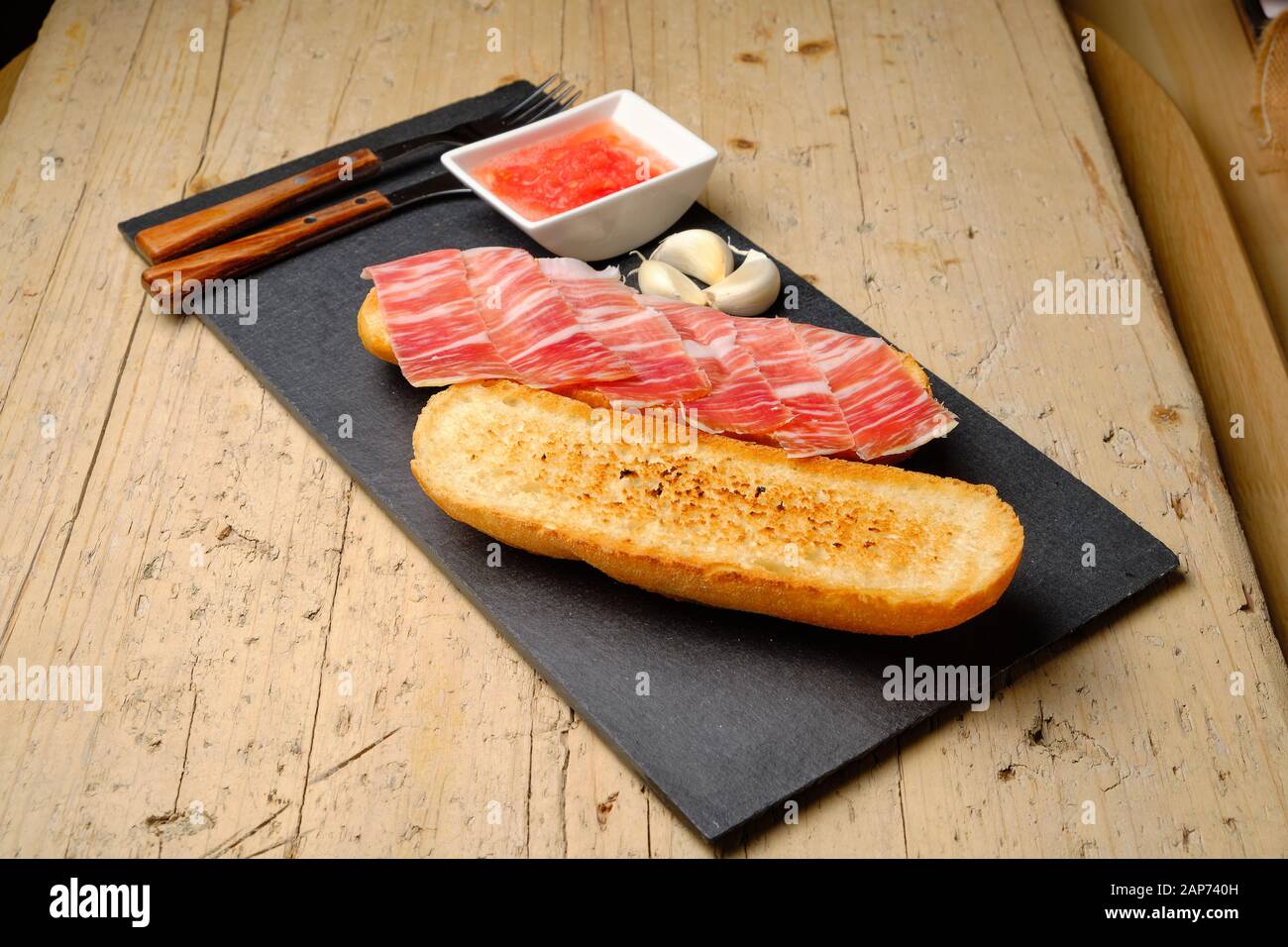 Serrano ham on tomato bread hi-res stock photography and images - Alamy