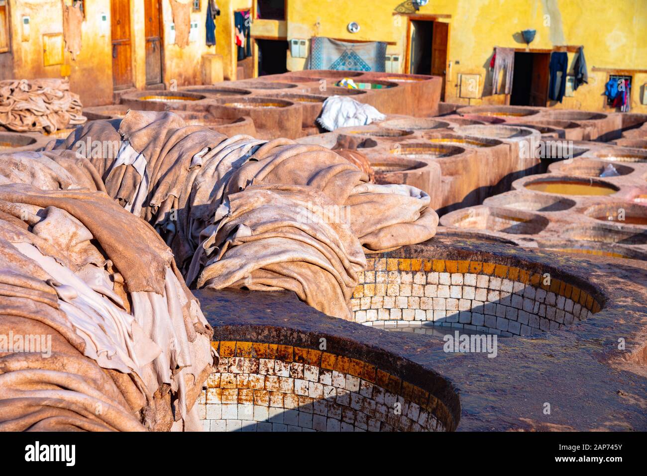 Leather dying in a traditional tannery in the city Fes, Morocco Stock ...