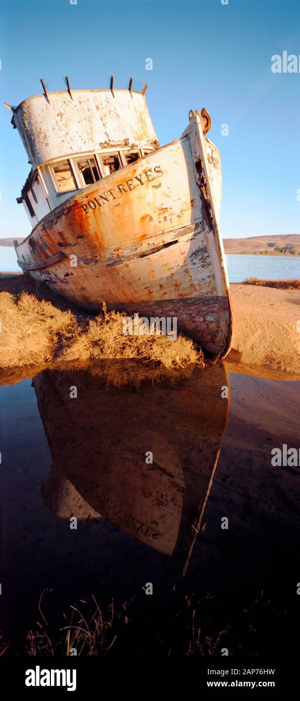 Wrecked ship on edge of river Stock Photo - Alamy
