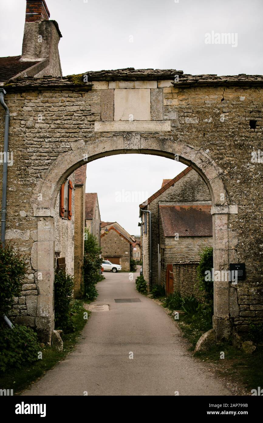 Archway Entrance into Small Town in France Stock Photo - Alamy
