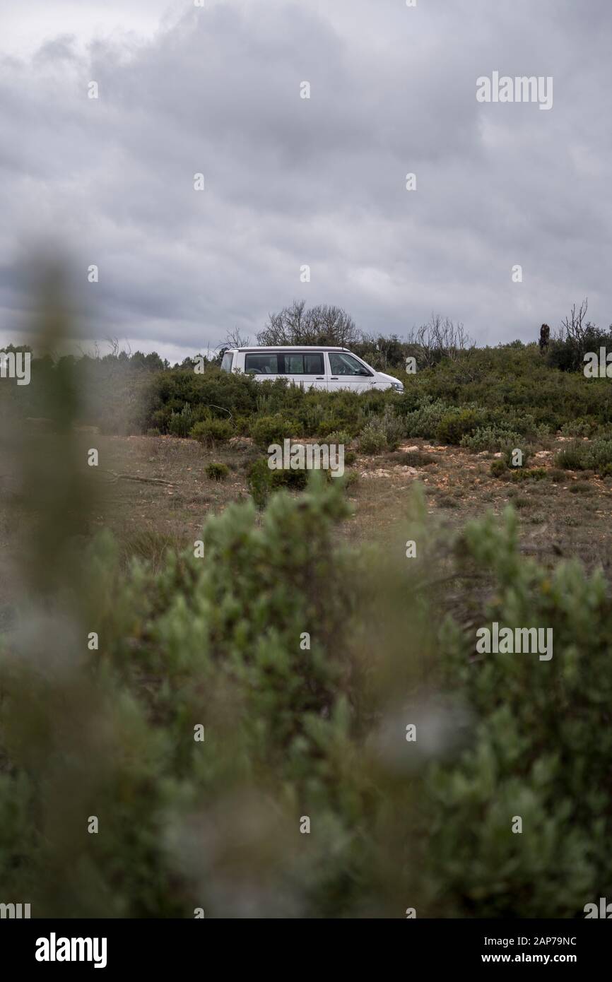 White van driving through the bush Stock Photo - Alamy