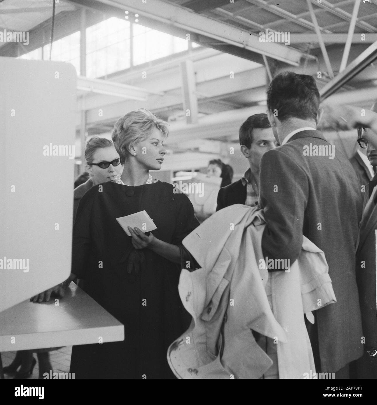 Arrival French movie stars at Schiphol Airport, Magali Noël at pass ...