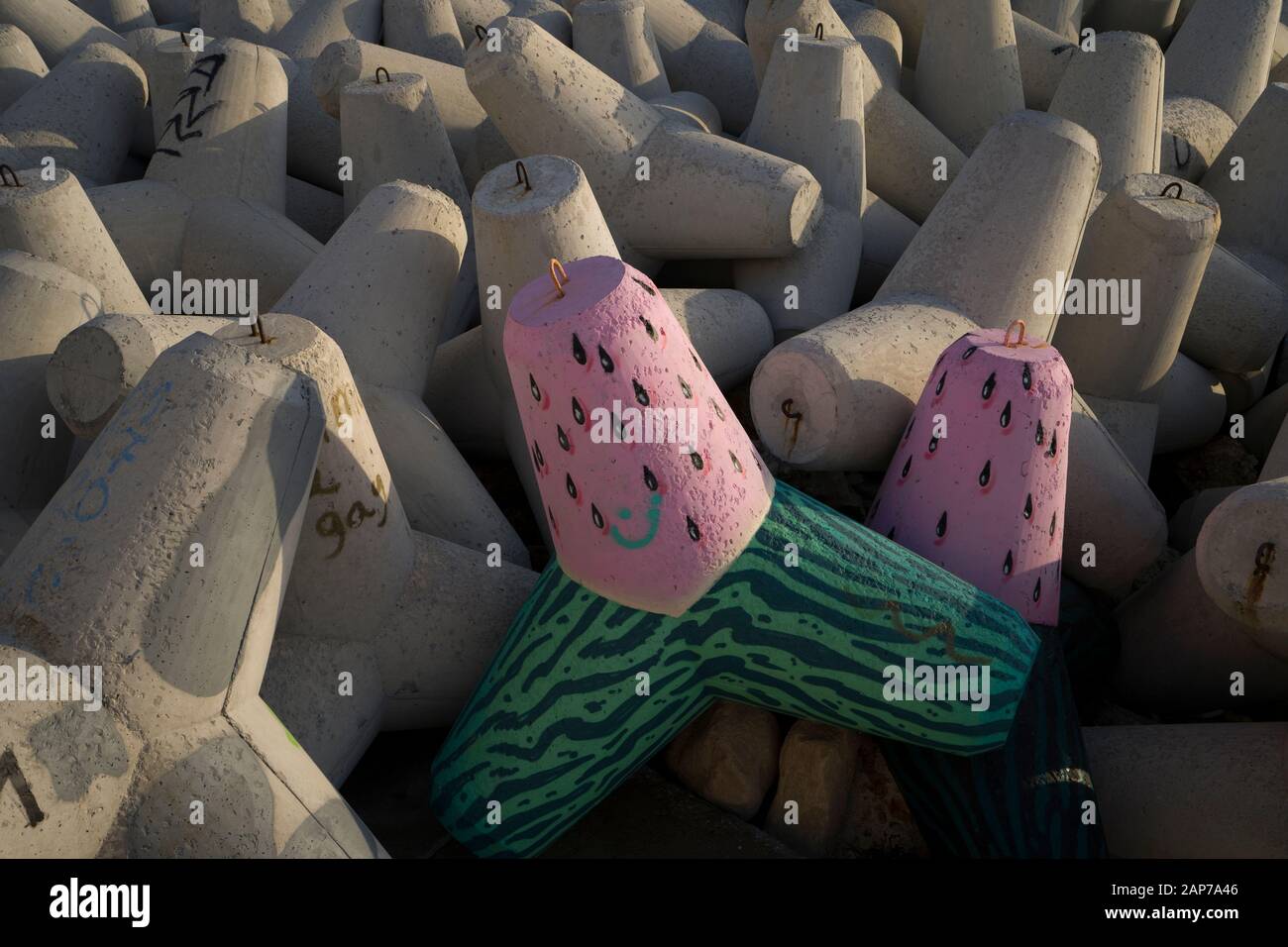 Tetrapod structure front sea watermelon erosion Stock Photo - Alamy