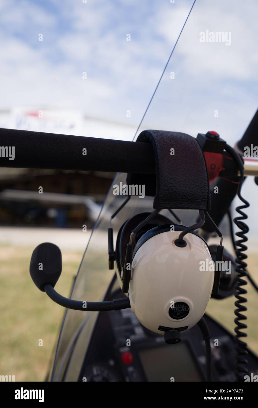 Microlight Ultralight aircraft white headset radio Stock Photo - Alamy