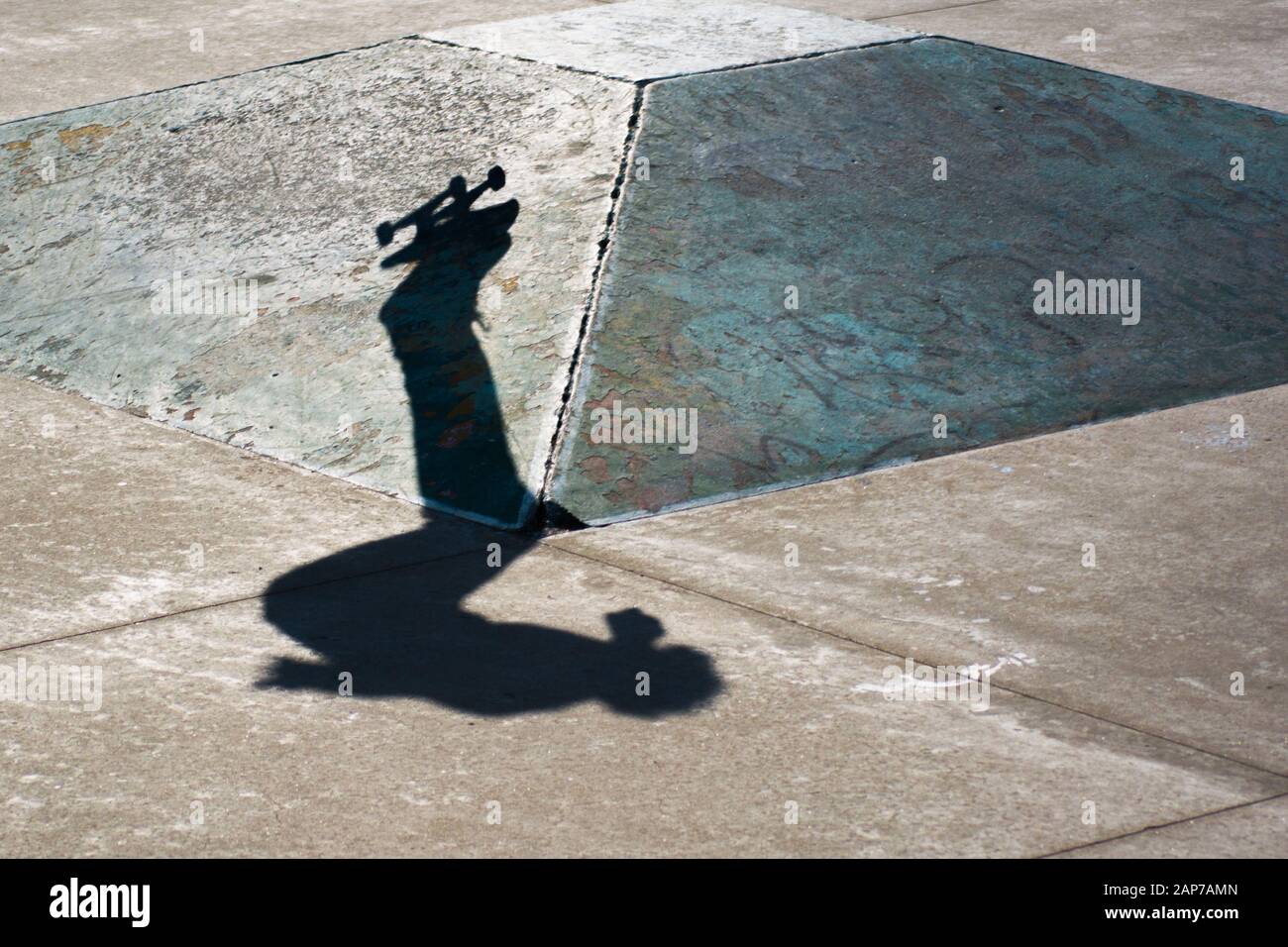 Skate risk sport shadow ramp Stock Photo - Alamy