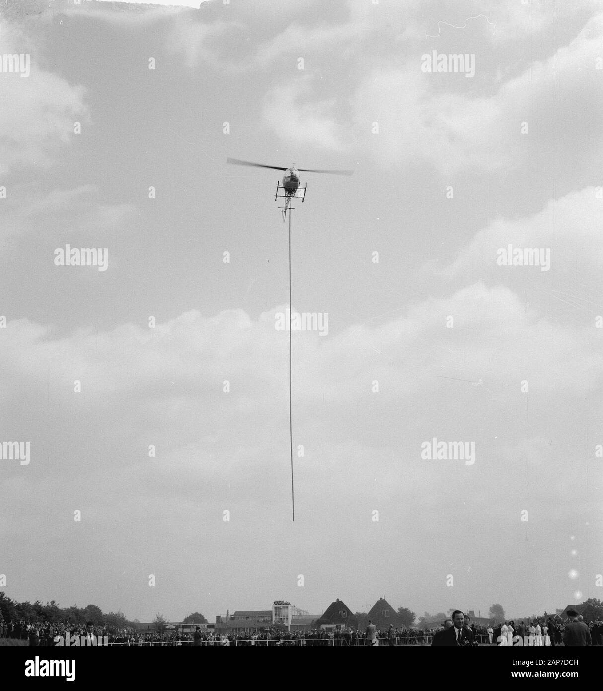 Pipe transport by air by helicopter. Helicopter with the tube Date: May ...