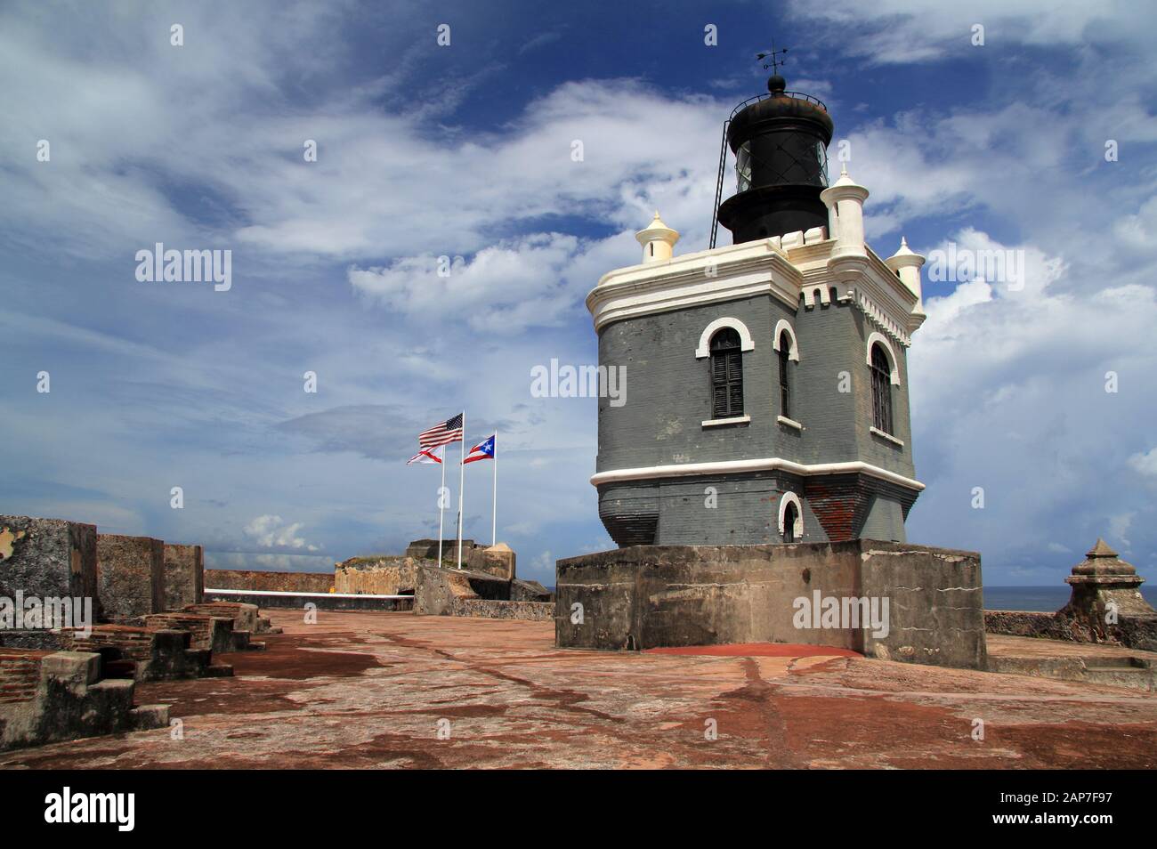 An old lighthouse sits atop the El Morro fortress, which is located in ...