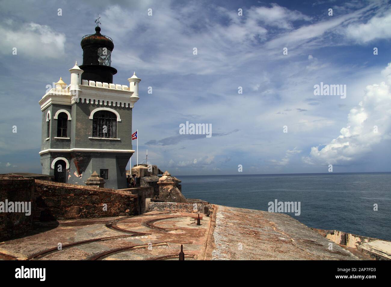 An old lighthouse sits atop the El Morro fortress, which is located in ...