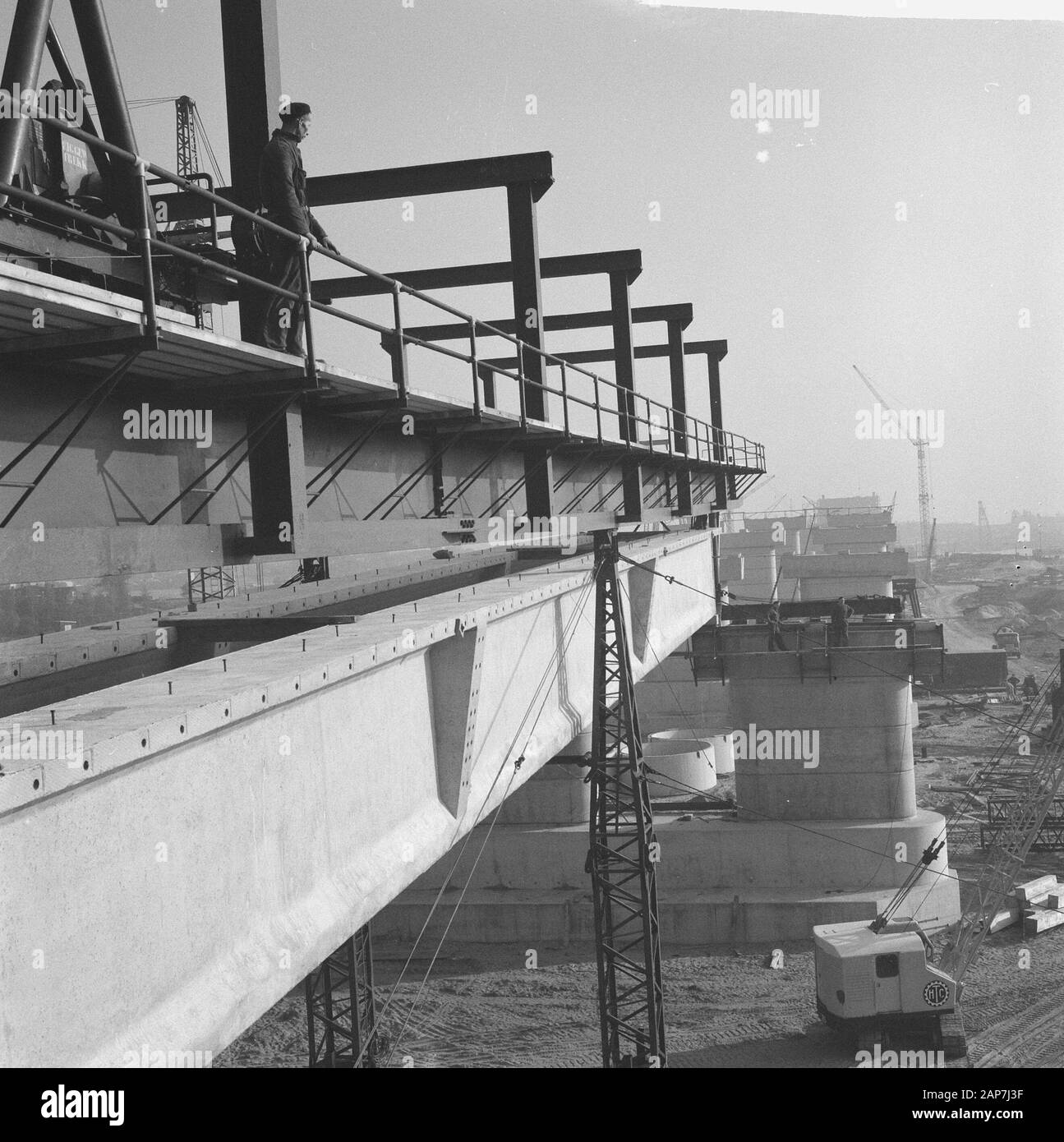 Construction workers hard work building Black and White Stock Photos ...