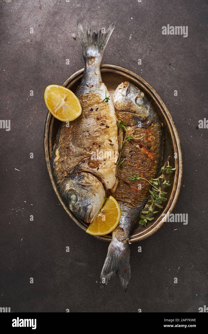 Fish on a platter Stock Photo - Alamy