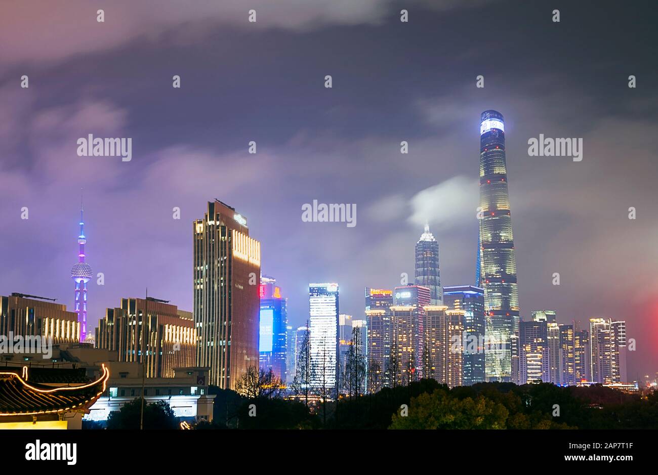 Shanghai skyline view from Chinese tea house on a stormy evening after ...
