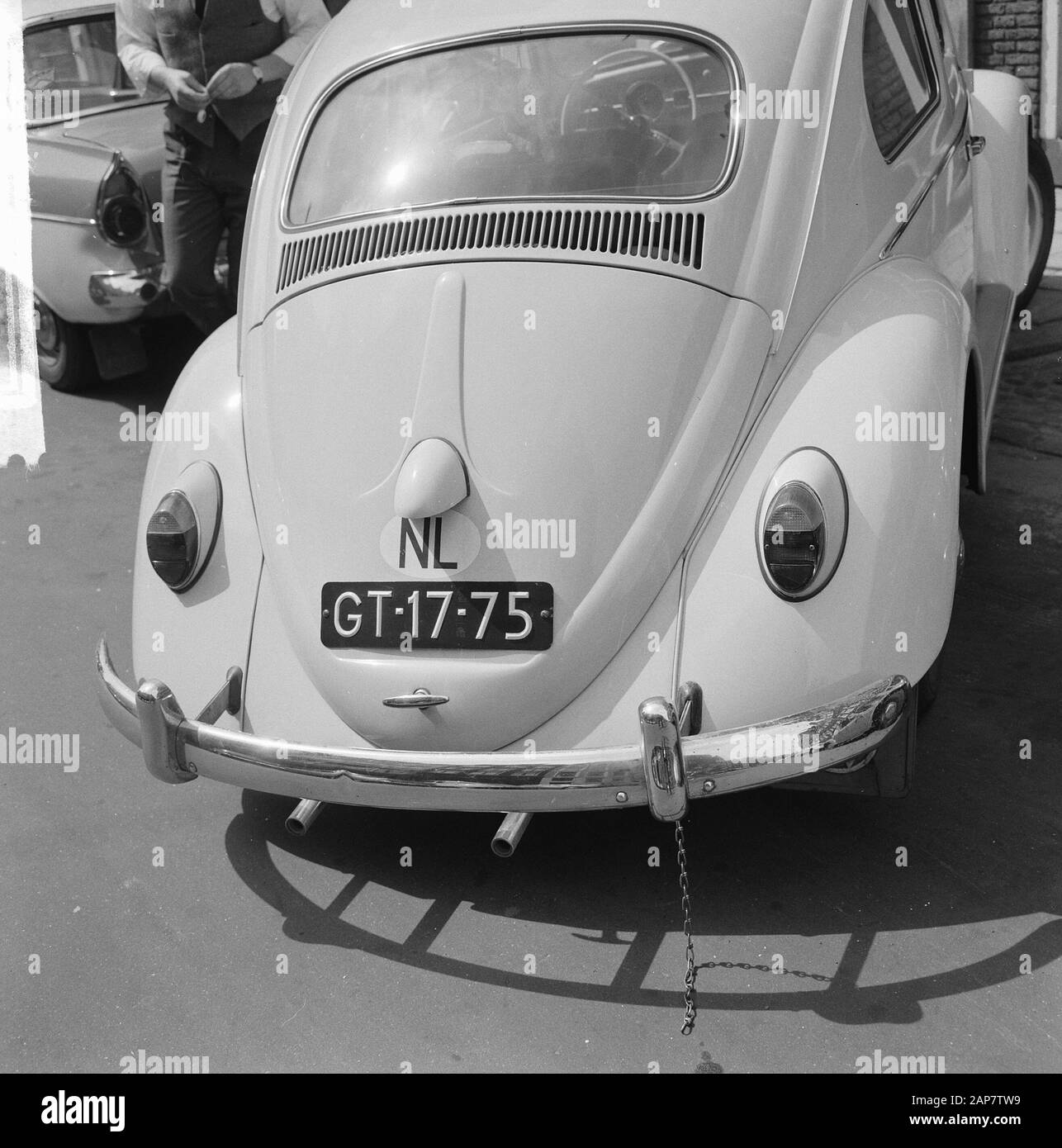 Car with chain attached to the bumper to prevent static electricity ...