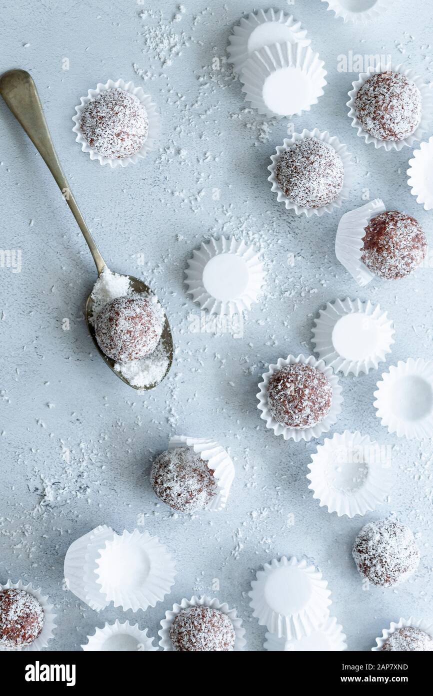 Chocolate truffles rolled in coconut Stock Photo - Alamy
