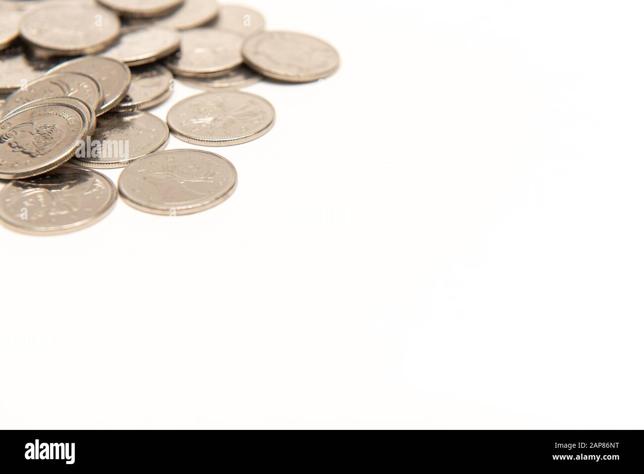 Canadian quarters isolated on white background with copy space Stock ...