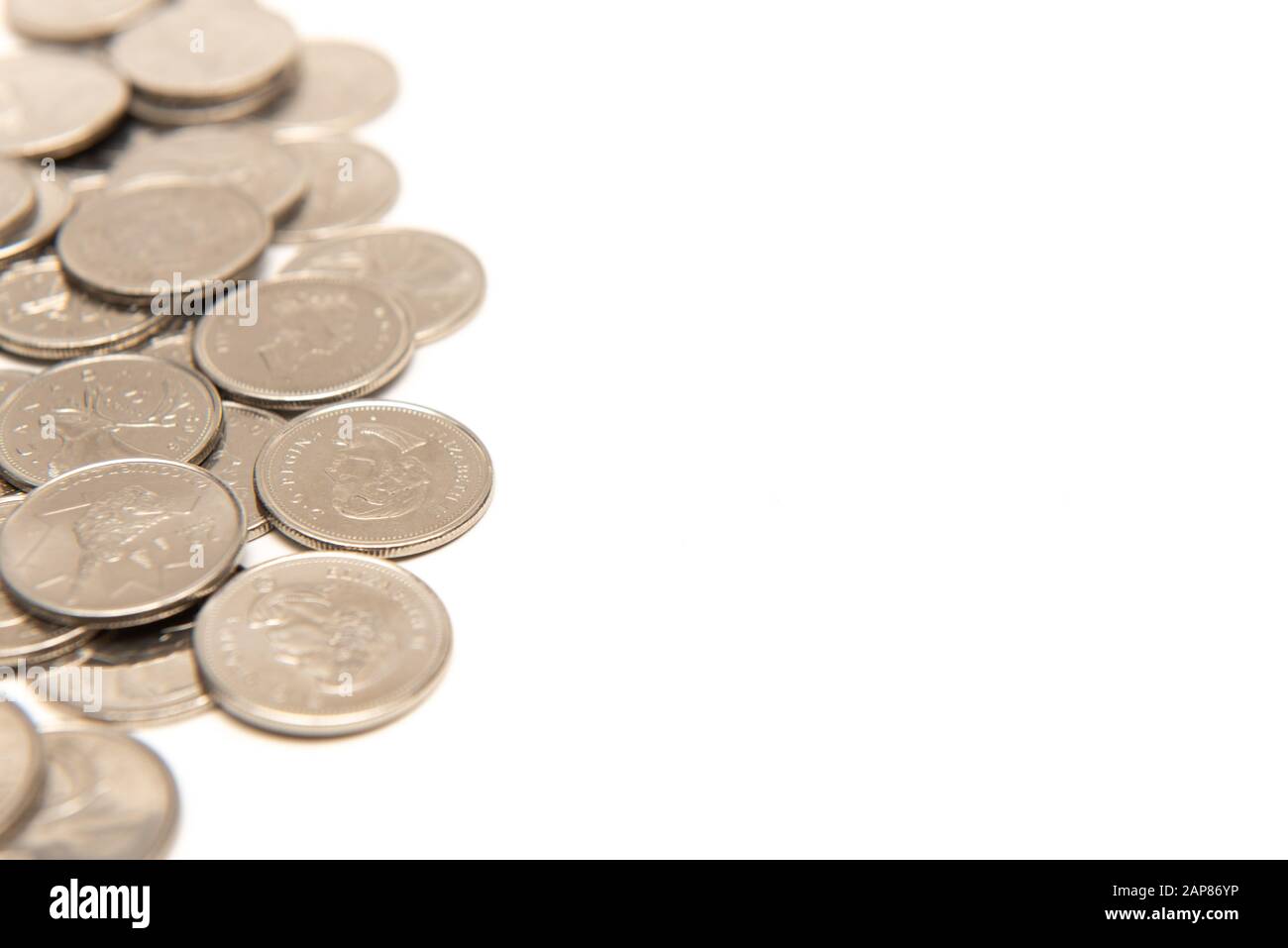 Canadian quarters isolated on white background with copy space Stock ...