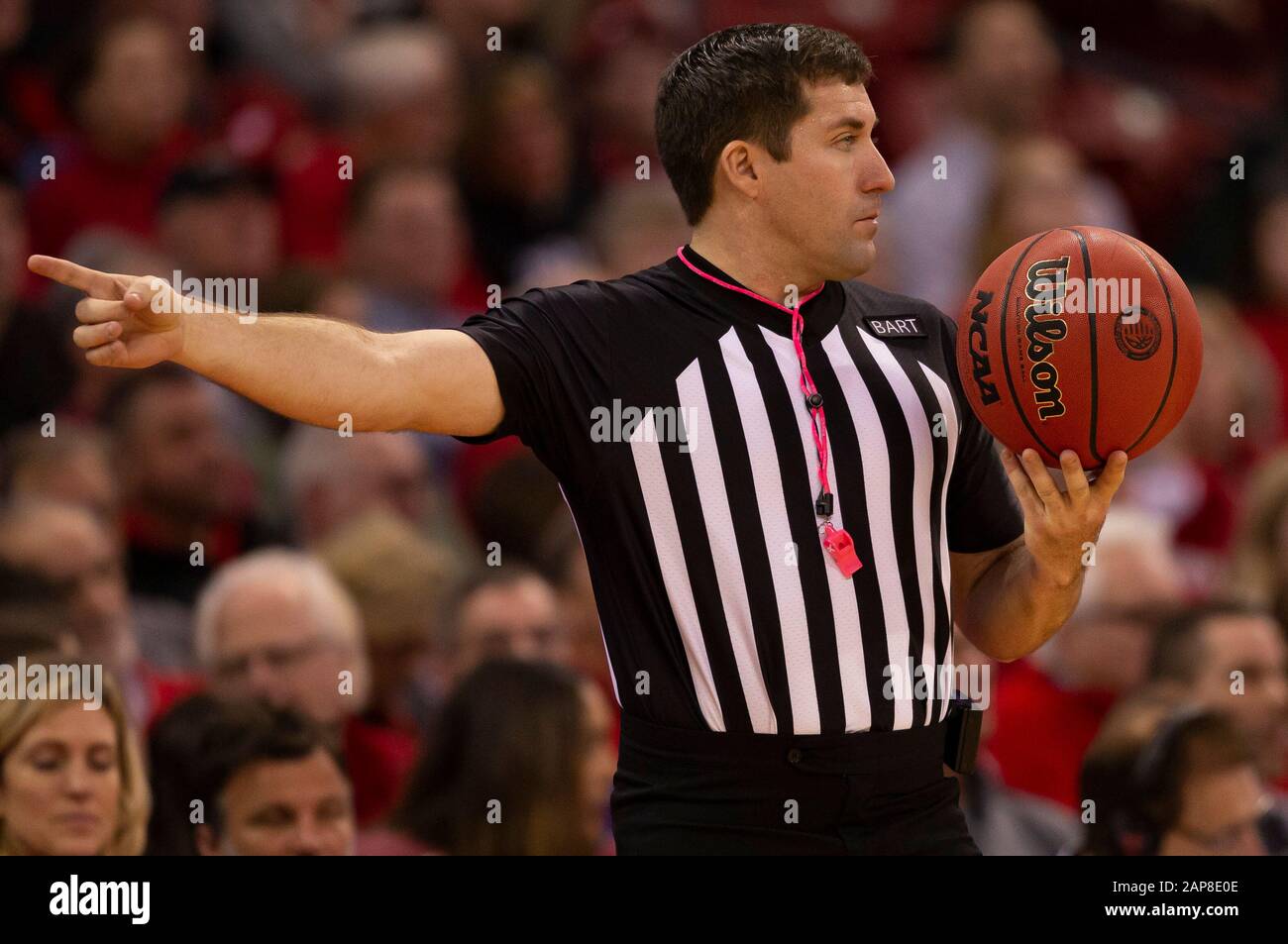 Madison, WI, USA. 21st Jan, 2020. Kelly Pfeifer wears a pink whistle ...