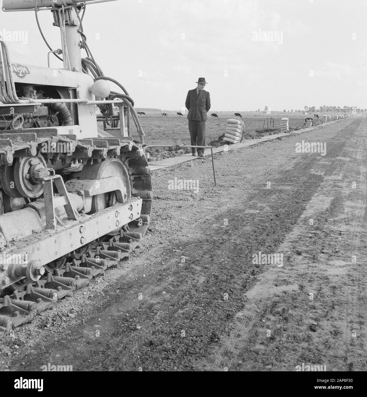 construction and improvement of roads, dikes and savings basins, gravel ...