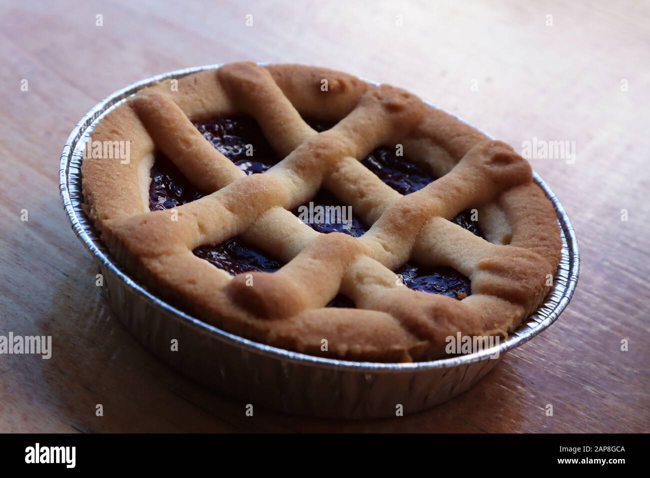 Mini strawberry jam pie in aluminium dish Stock Photo - Alamy