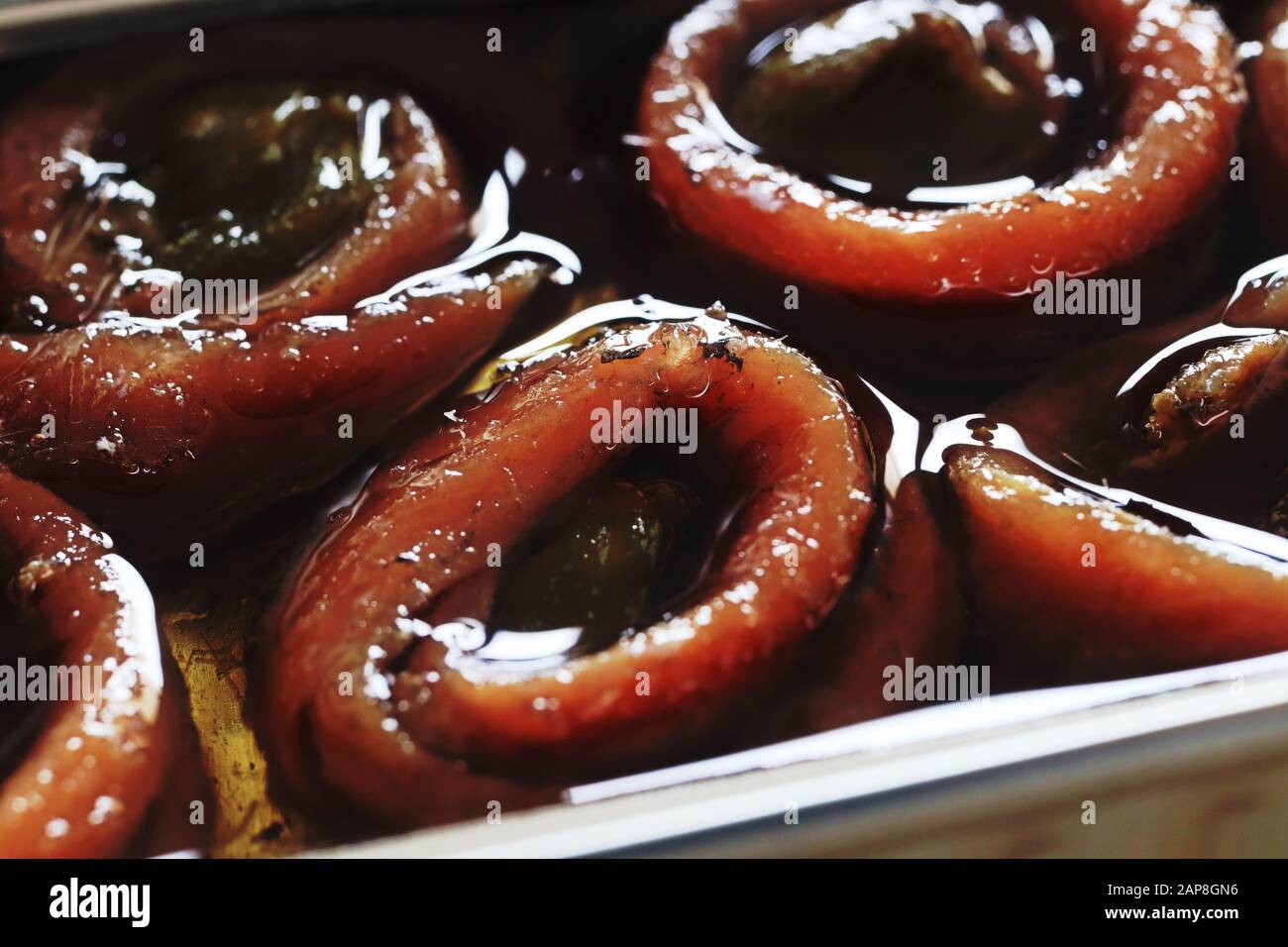 Tin of rolled up anchovies with capers Stock Photo - Alamy