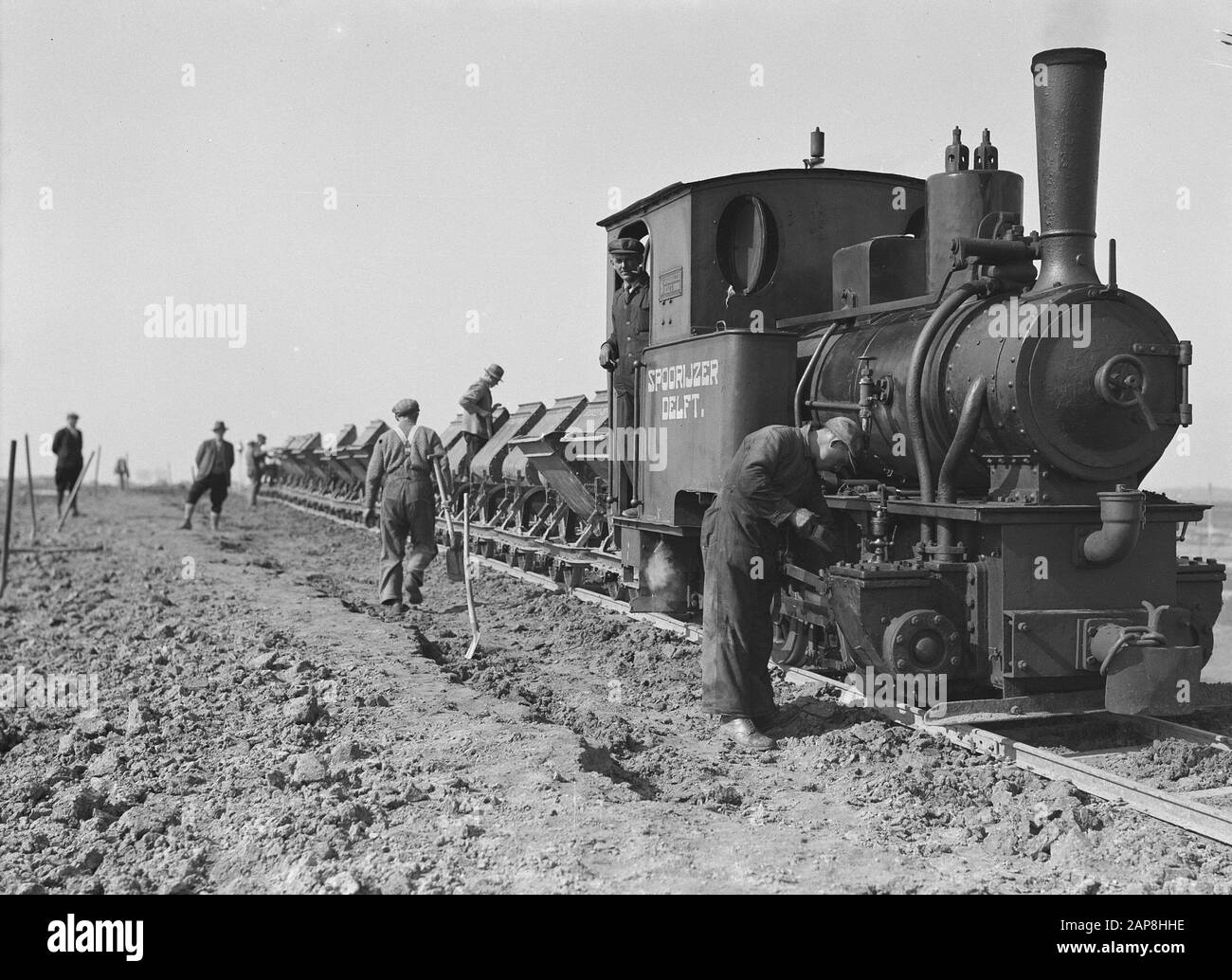 Workers Work Rails Locomotives Tipping Carts Date Undated Keywords