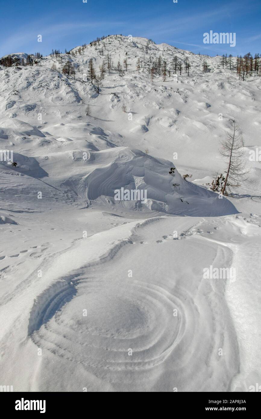 Circles made in snow, mountains Stock Photo - Alamy