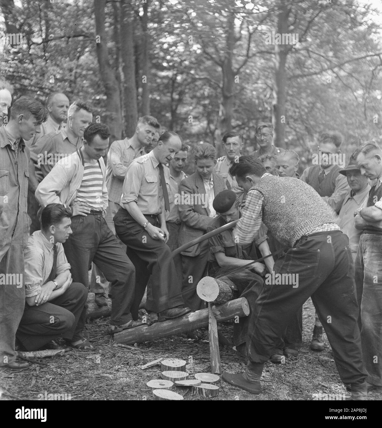 Working under a tree Black and White Stock Photos & Images - Alamy