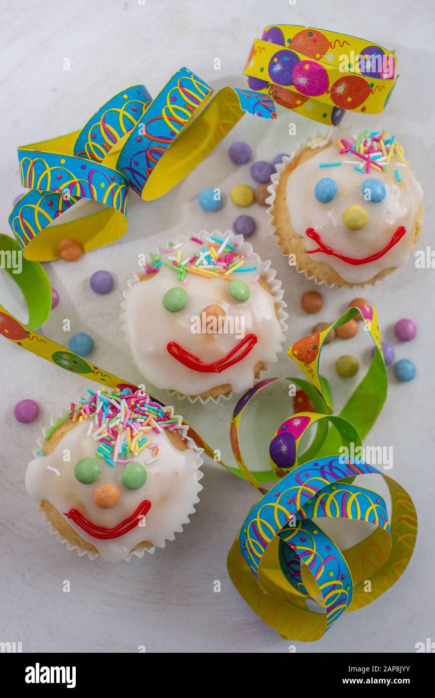 carnival clown muffins decorated with multi colored chocolate lentils ...