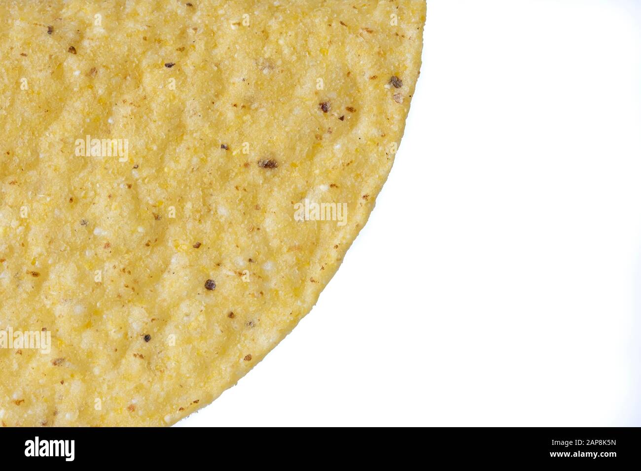 Macro image of the edge a hard taco shell on a white background Stock ...