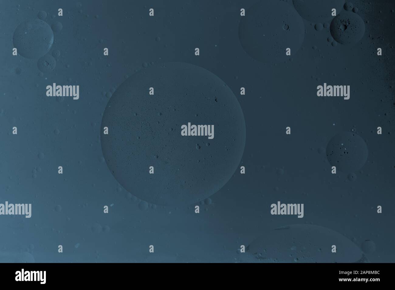 Oil bubbles inside water base form patterns Stock Photo - Alamy