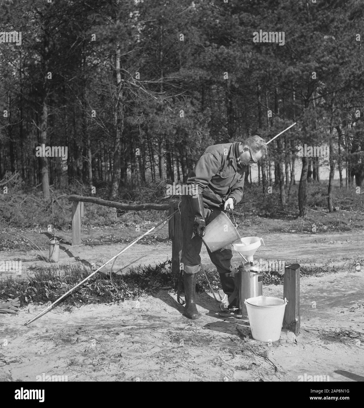 workers, spray installations, buckets, funnels, filling works Date ...