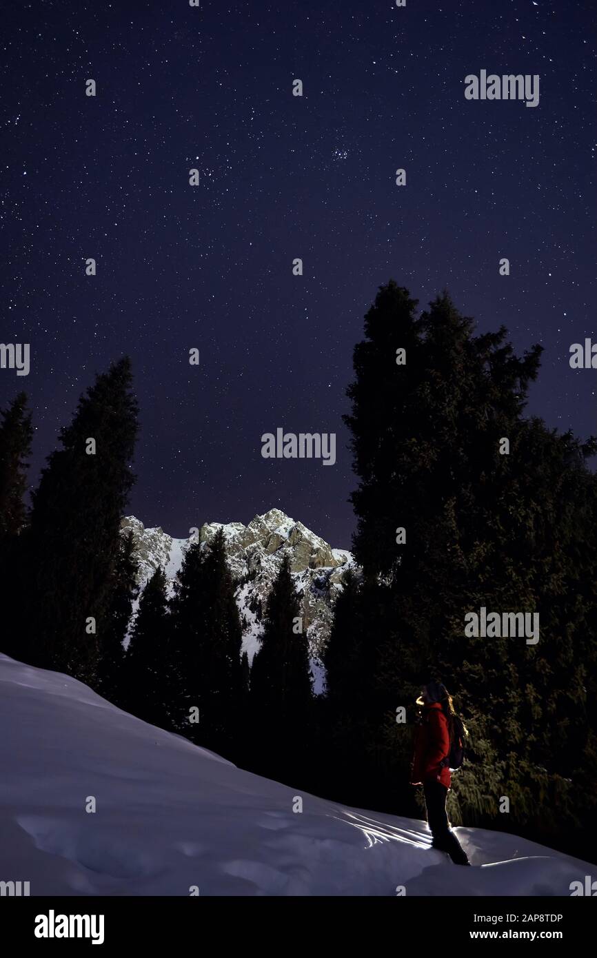 Man standing under stars at night hi-res stock photography and images ...