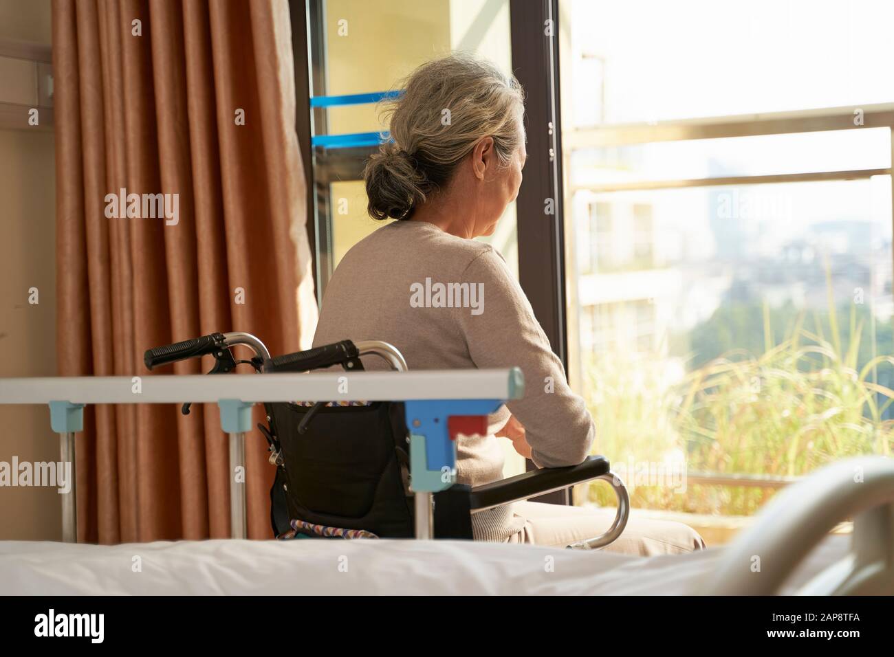 Old woman window dementia hi-res stock photography and images - Alamy