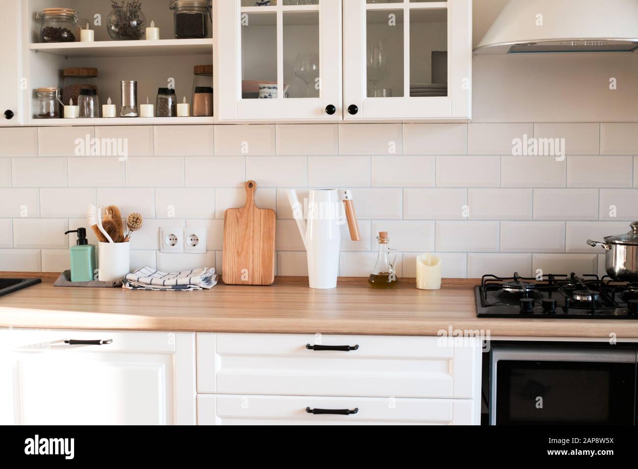 Light modern kitchen in cozy house. Home interior Stock Photo - Alamy
