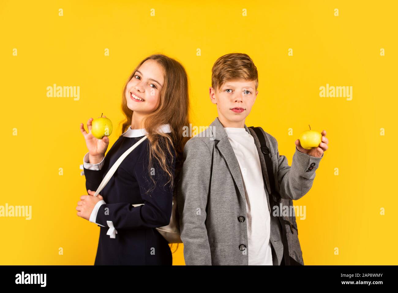 Eating apples improve learning. Little children eat apples. Small kids ...