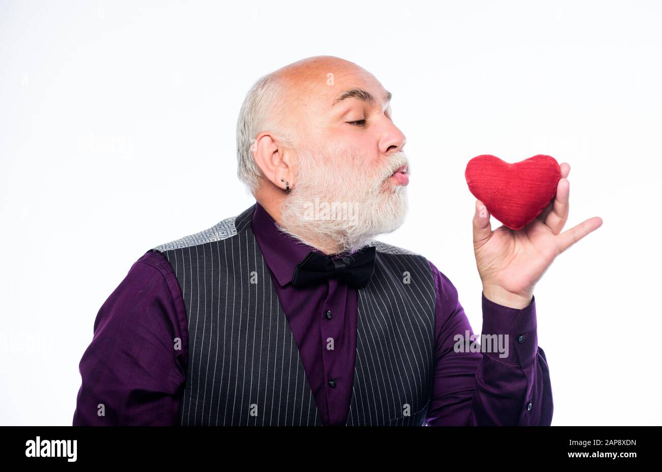 Health care. Senior bald head bearded man hold red heart. Heart problem ...