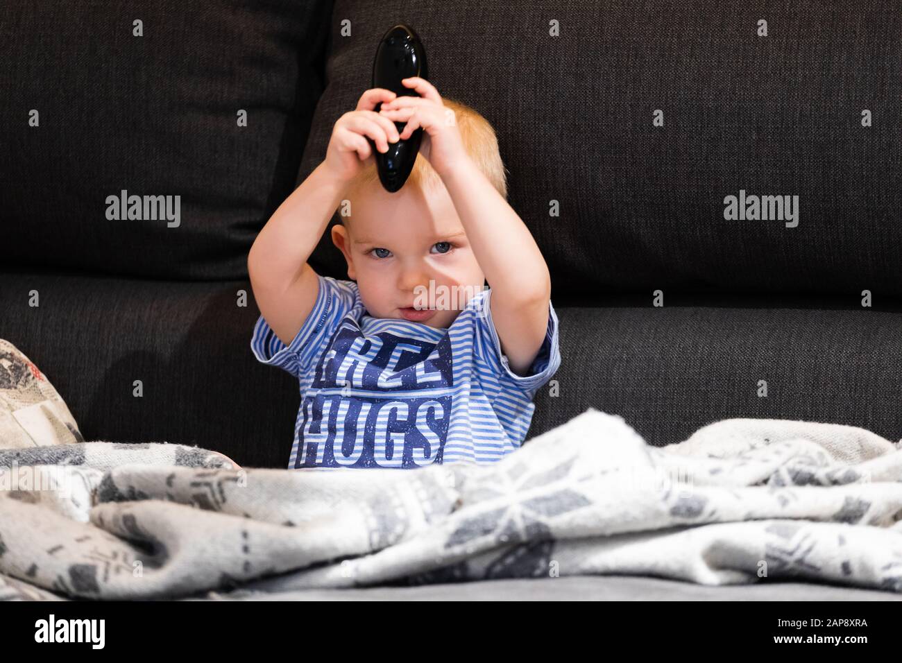 Little boy watching tv Stock Photo - Alamy