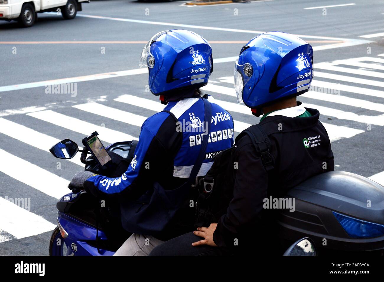 Pasig City,Philippines - January 14, 2020: Motorcycle taxi driver and ...
