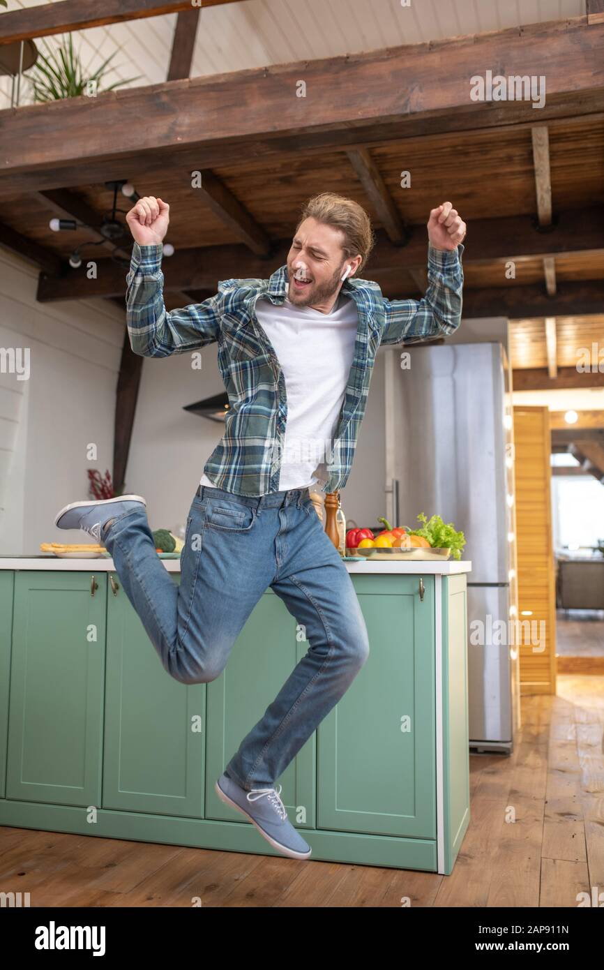 Dancing man alone in kitchen hi-res stock photography and images - Alamy