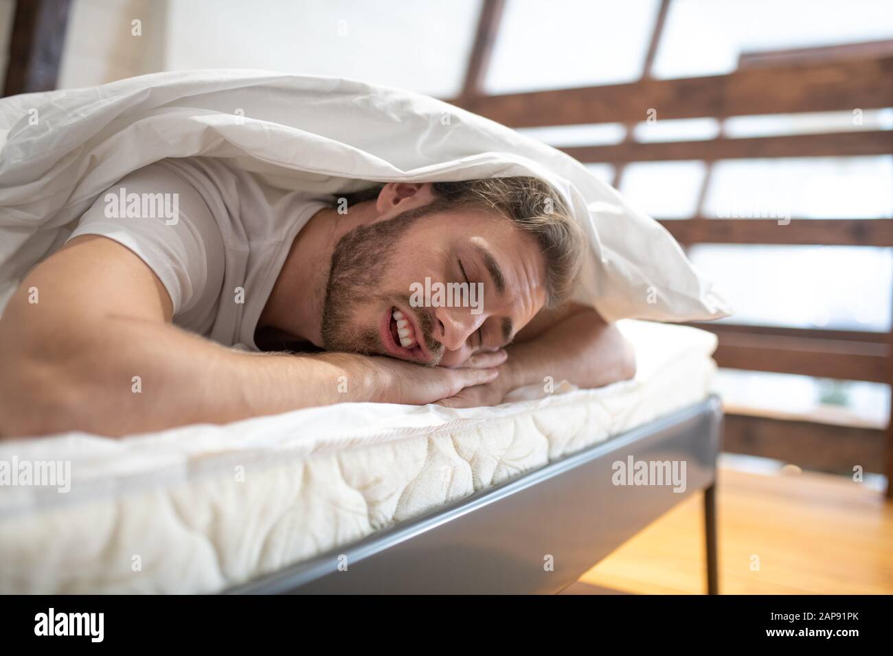 Feeling sleepy young bearded hi-res stock photography and images - Alamy