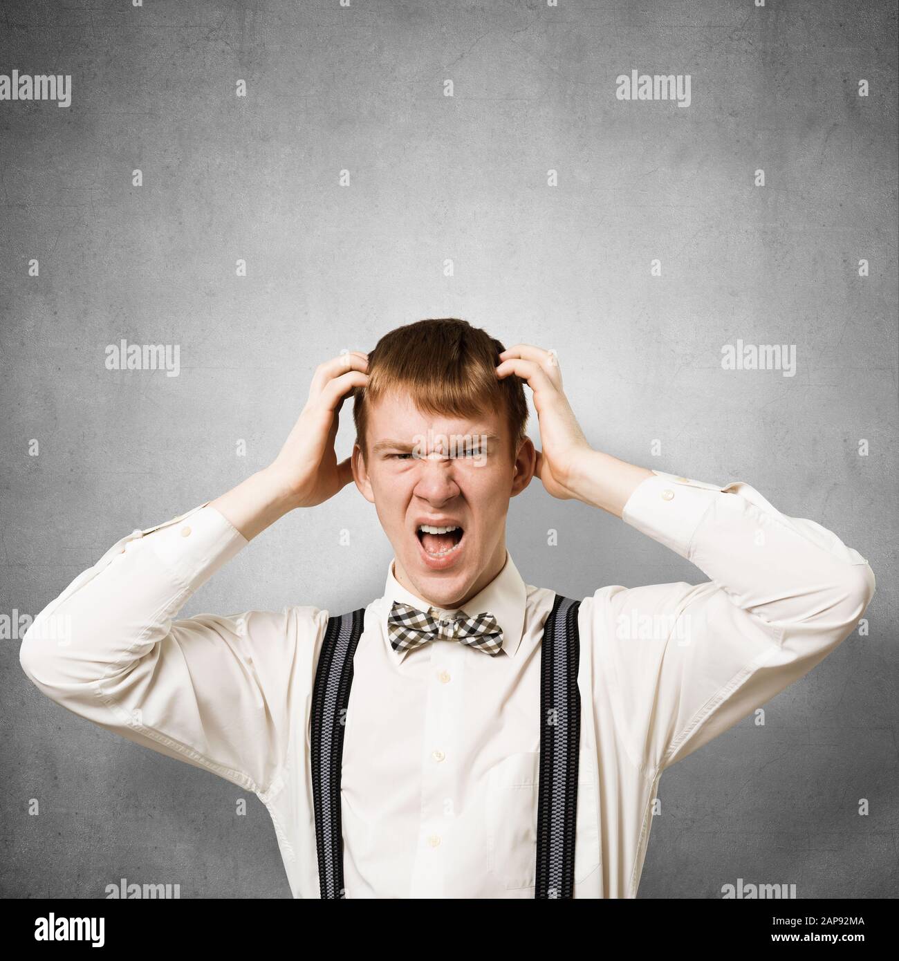 Stressful teenager screaming with panic Stock Photo - Alamy